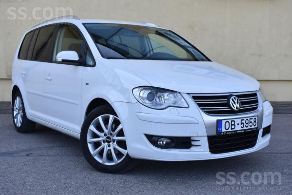 White Volkswagen Touran 2009 in Talsi, with an engine capacity of 1.40 L and mileage of 185 thousand km for 5700 €, photo 1 on AUTOMOTO.COM.LV