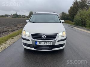 White Volkswagen Touran 2009 in Bauska, with an engine capacity of 1.90 L and mileage of 0 thousand km for 1900 €, photo 3 on AUTOMOTO.COM.LV