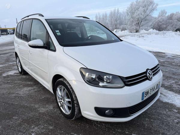 Balts Volkswagen Touran 2011 Tauragė, ar dzinēja tilpumu 1.60 L un nobraukumu 242 tūkst. km par 4900 €, foto 2 vietnē AUTOMOTO.COM.LV