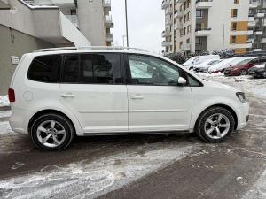 White Volkswagen Touran 2011 in Vilnius, with an engine capacity of 1.97 L and mileage of 344 thousand km for 4100 €, photo 7 on AUTOMOTO.COM.LV