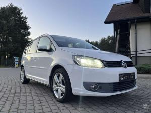White Volkswagen Touran 2011 in Druskininkai, with an engine capacity of 1.39 L and mileage of 275 thousand km for 4900 €, photo 5 on AUTOMOTO.COM.LV