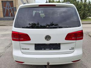 White Volkswagen Touran 2011 in Ukmerge, with an engine capacity of 1.20 L and mileage of 241 thousand km for 3950 €, photo 6 on AUTOMOTO.COM.LV