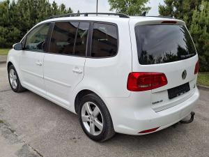 White Volkswagen Touran 2011 in Ukmerge, with an engine capacity of 1.20 L and mileage of 241 thousand km for 3950 €, photo 7 on AUTOMOTO.COM.LV