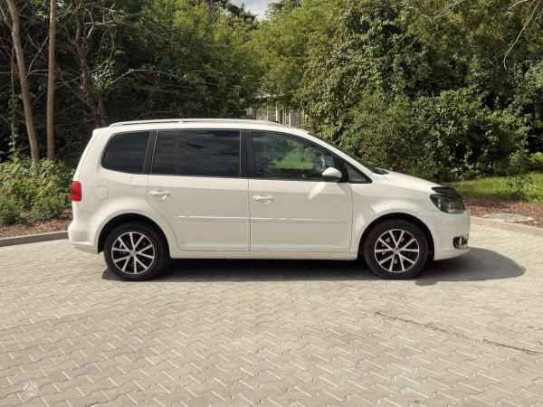 Фольксваген Туран 2011 в Вильнюс на AUTOMOTO.COM.LV Белый Фольксваген Туран 2011 в Вильнюс, объемом двигателя 1.60 л и пробегом 214 тыс. км за 3999 €, фото 7 на AUTOMOTO.COM.LV