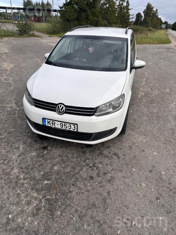 White Volkswagen Touran 2011 in Bauska, with an engine capacity of 1.70 L and mileage of 407 thousand km for 4100 €, photo 5 on AUTOMOTO.COM.LV