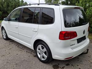 White Volkswagen Touran 2011 in Ukmerge, with an engine capacity of 1.20 L and mileage of 241 thousand km for 3850 €, photo 5 on AUTOMOTO.COM.LV