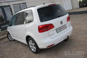 White Volkswagen Touran 2011 in Tukums, with an engine capacity of 1.60 L and mileage of 205 thousand km for 6358 €, photo 5 on AUTOMOTO.COM.LV
