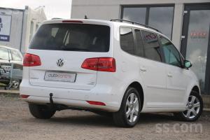 White Volkswagen Touran 2011 in Tukums, with an engine capacity of 1.60 L and mileage of 205 thousand km for 6358 €, photo 6 on AUTOMOTO.COM.LV