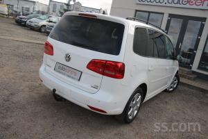 White Volkswagen Touran 2011 in Tukums, with an engine capacity of 1.60 L and mileage of 205 thousand km for 6358 €, photo 7 on AUTOMOTO.COM.LV