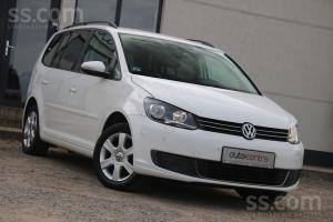 White Volkswagen Touran 2011 in Tukums, with an engine capacity of 1.60 L and mileage of 205 thousand km for 6358 €, photo 8 on AUTOMOTO.COM.LV