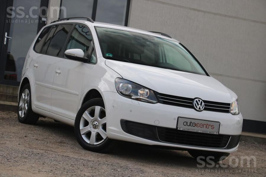 White Volkswagen Touran 2011 in Tukums, with an engine capacity of 1.60 L and mileage of 205 thousand km for 6358 €, photo 8 on AUTOMOTO.COM.LV