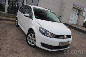 White Volkswagen Touran 2011 in Tukums, with an engine capacity of 1.60 L and mileage of 205 thousand km for 6358 €, photo 9 on AUTOMOTO.COM.LV