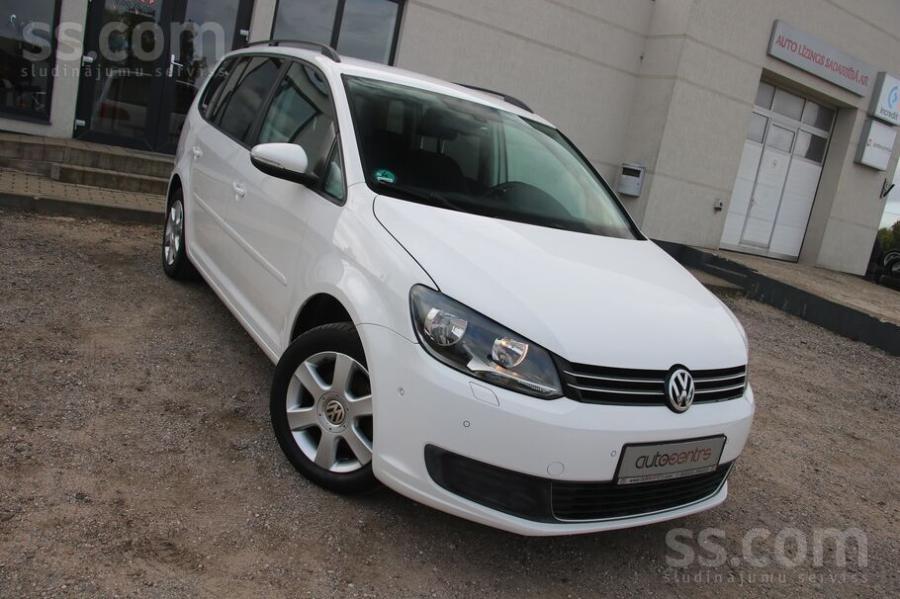White Volkswagen Touran 2011 in Tukums, with an engine capacity of 1.60 L and mileage of 205 thousand km for 6358 €, photo 9 on AUTOMOTO.COM.LV