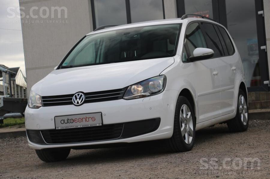White Volkswagen Touran 2011 in Tukums, with an engine capacity of 1.60 L and mileage of 205 thousand km for 6358 €, photo 25 on AUTOMOTO.COM.LV