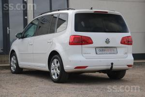 White Volkswagen Touran 2011 in Tukums, with an engine capacity of 1.60 L and mileage of 205 thousand km for 6358 €, photo 26 on AUTOMOTO.COM.LV