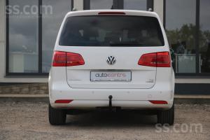 White Volkswagen Touran 2011 in Tukums, with an engine capacity of 1.60 L and mileage of 205 thousand km for 6358 €, photo 27 on AUTOMOTO.COM.LV