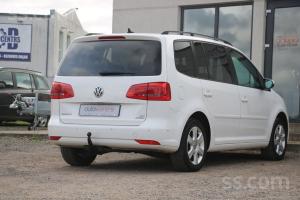 White Volkswagen Touran 2011 in Tukums, with an engine capacity of 1.60 L and mileage of 205 thousand km for 6358 €, photo 28 on AUTOMOTO.COM.LV