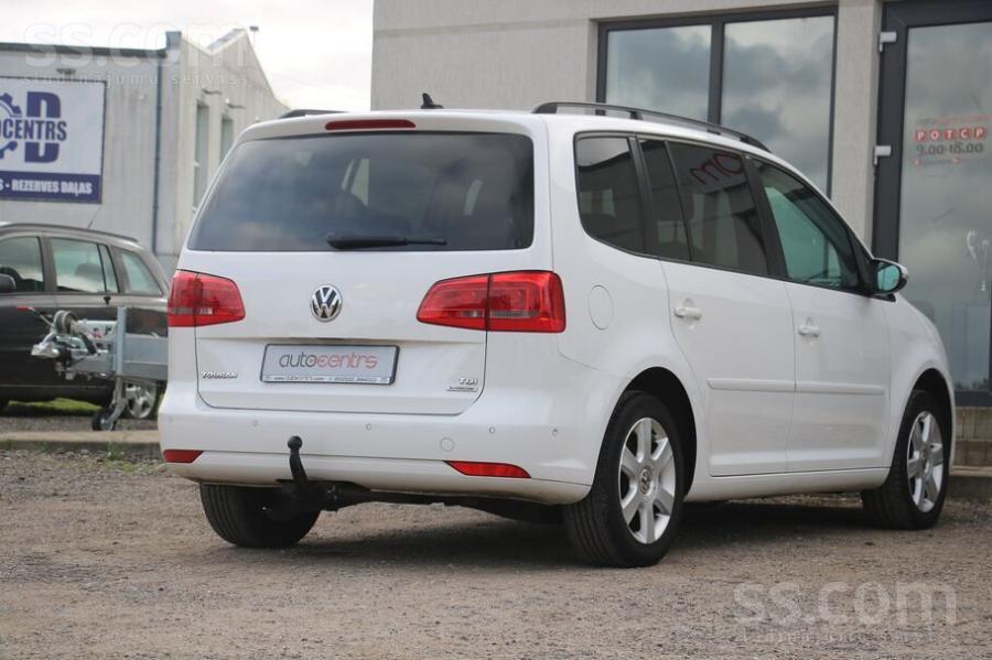 White Volkswagen Touran 2011 in Tukums, with an engine capacity of 1.60 L and mileage of 205 thousand km for 6358 €, photo 28 on AUTOMOTO.COM.LV