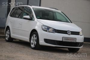 White Volkswagen Touran 2011 in Tukums, with an engine capacity of 1.60 L and mileage of 205 thousand km for 6358 €, photo 29 on AUTOMOTO.COM.LV