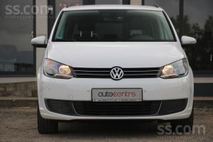 White Volkswagen Touran 2011 in Tukums, with an engine capacity of 1.60 L and mileage of 205 thousand km for 6358 €, photo 30 on AUTOMOTO.COM.LV