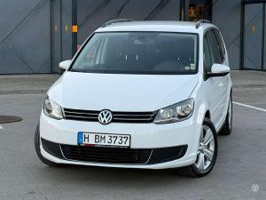 White Volkswagen Touran 2012 in Jonava, with an engine capacity of 1.60 L and mileage of 300 thousand km for 5450 €, photo  on AUTOMOTO.COM.LV