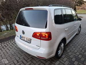 White Volkswagen Touran 2012 in Marijampole, with an engine capacity of 1.60 L and mileage of 348 thousand km for 3999 €, photo 4 on AUTOMOTO.COM.LV