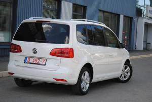White Volkswagen Touran 2012 in Riga, with an engine capacity of 1.60 L and mileage of 238 thousand km for 7290 €, photo 3 on AUTOMOTO.COM.LV