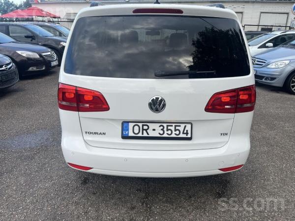 Balts Volkswagen Touran 2012 Rīga, ar dzinēja tilpumu 1.60 L un nobraukumu 0 tūkst. km par 5950 €, foto 8 vietnē AUTOMOTO.COM.LV