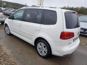 White Volkswagen Touran 2013 in Vilnius, with an engine capacity of 1.60 L and mileage of 191 thousand km for 6950 €, photo 4 on AUTOMOTO.COM.LV