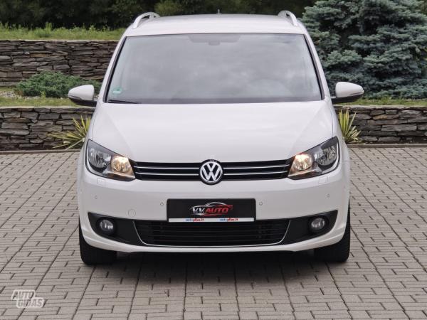 White Volkswagen Touran 2013 in Vilnius, with an engine capacity of 2.00 L and mileage of 264 thousand km for 6500 €, photo 3 on AUTOMOTO.COM.LV
