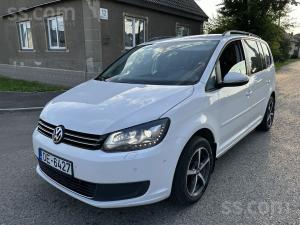White Volkswagen Touran 2013 in Daugavpils, with an engine capacity of 1.40 L and mileage of 0 thousand km for 4550 €, photo  on AUTOMOTO.COM.LV