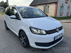 White Volkswagen Touran 2013 in Daugavpils, with an engine capacity of 1.40 L and mileage of 0 thousand km for 4550 €, photo 4 on AUTOMOTO.COM.LV