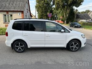 White Volkswagen Touran 2013 in Daugavpils, with an engine capacity of 1.40 L and mileage of 0 thousand km for 4550 €, photo 5 on AUTOMOTO.COM.LV