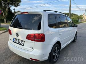White Volkswagen Touran 2013 in Daugavpils, with an engine capacity of 1.40 L and mileage of 0 thousand km for 4550 €, photo 6 on AUTOMOTO.COM.LV