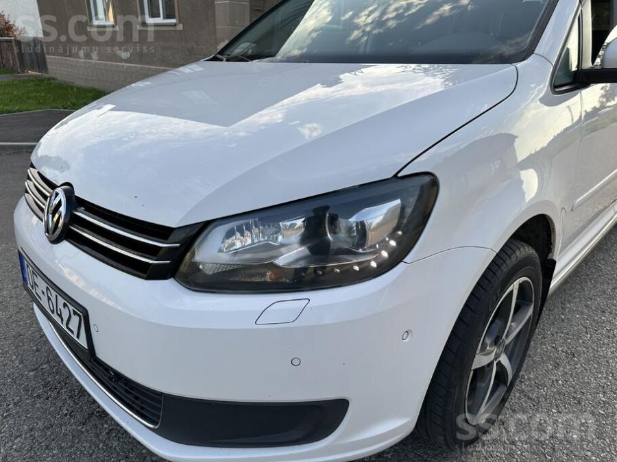 White Volkswagen Touran 2013 in Daugavpils, with an engine capacity of 1.40 L and mileage of 0 thousand km for 4550 €, photo 10 on AUTOMOTO.COM.LV