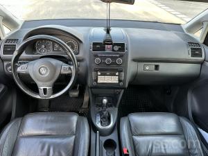 White Volkswagen Touran 2013 in Daugavpils, with an engine capacity of 1.40 L and mileage of 0 thousand km for 4550 €, photo 14 on AUTOMOTO.COM.LV