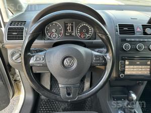 White Volkswagen Touran 2013 in Daugavpils, with an engine capacity of 1.40 L and mileage of 0 thousand km for 4550 €, photo 19 on AUTOMOTO.COM.LV