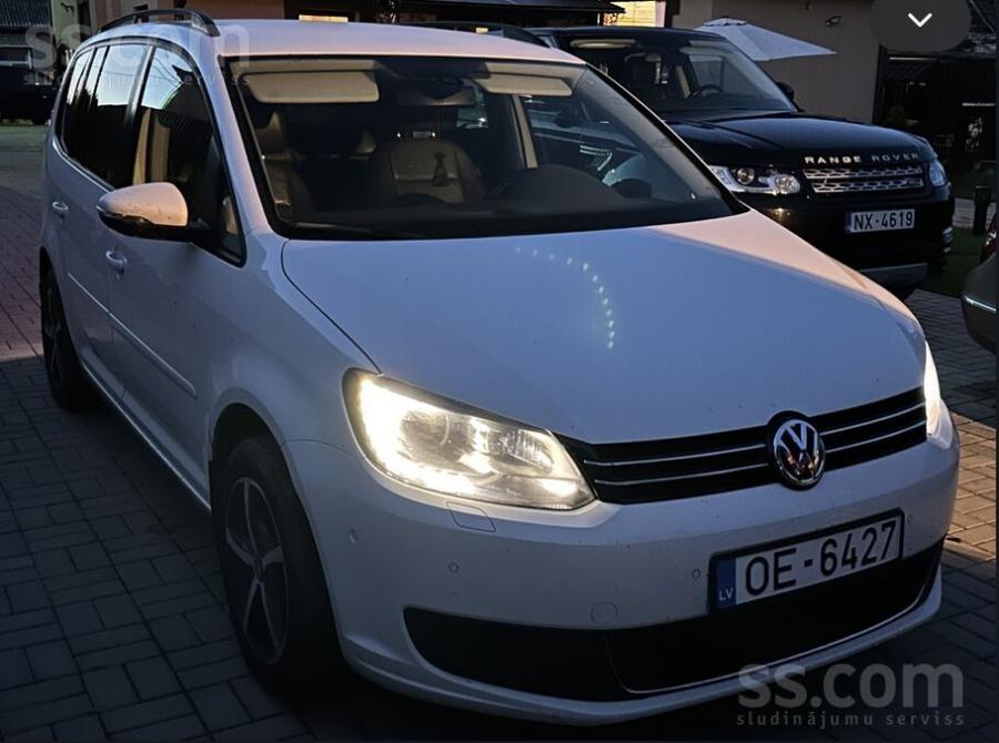 White Volkswagen Touran 2013 in Daugavpils, with an engine capacity of 1.40 L and mileage of 0 thousand km for 4550 €, photo 22 on AUTOMOTO.COM.LV