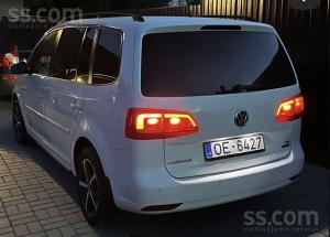 White Volkswagen Touran 2013 in Daugavpils, with an engine capacity of 1.40 L and mileage of 0 thousand km for 4550 €, photo 23 on AUTOMOTO.COM.LV