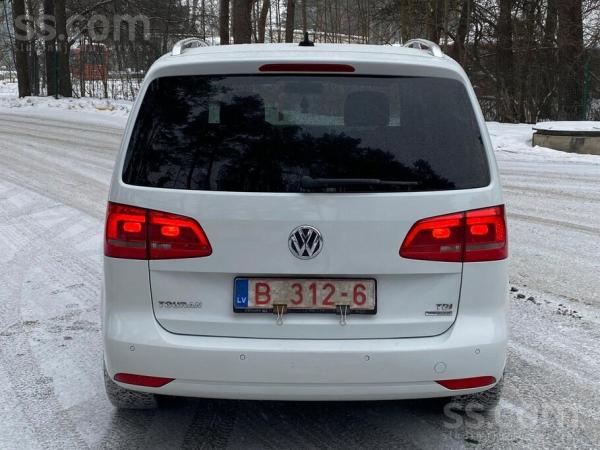 Balts Volkswagen Touran 2014 Rīga, ar dzinēja tilpumu 1.60 L un nobraukumu 0 tūkst. km par 5499 €, foto 4 vietnē AUTOMOTO.COM.LV