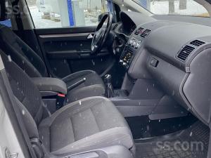 Balts Volkswagen Touran 2014 Rīga, ar dzinēja tilpumu 1.60 L un nobraukumu 0 tūkst. km par 5499 €, foto 21 vietnē AUTOMOTO.COM.LV