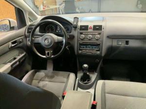 White Volkswagen Touran 2014 in Vilnius, with an engine capacity of 1.39 L and mileage of 247 thousand km for 7745 €, photo 6 on AUTOMOTO.COM.LV