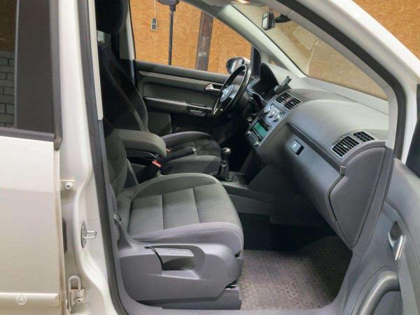 White Volkswagen Touran 2014 in Vilnius, with an engine capacity of 1.39 L and mileage of 247 thousand km for 7745 €, photo 6 on AUTOMOTO.COM.LV