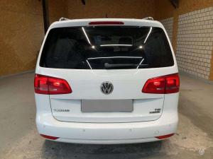 White Volkswagen Touran 2014 in Vilnius, with an engine capacity of 1.39 L and mileage of 247 thousand km for 7745 €, photo 12 on AUTOMOTO.COM.LV