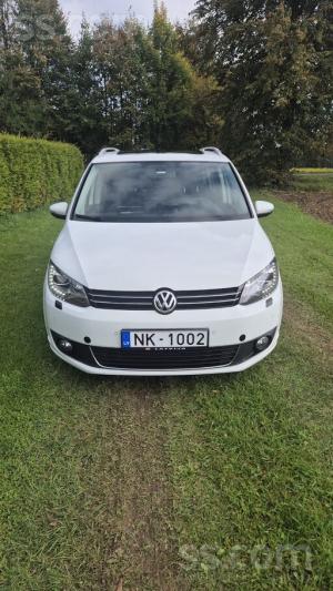 Balts Volkswagen Touran 2014 Valmiera, ar dzinēja tilpumu 2.00 L un nobraukumu 240 tūkst. km par 5200 €, foto  vietnē AUTOMOTO.COM.LV