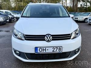 White Volkswagen Touran 2015 in Riga, with an engine capacity of 1.60 L and mileage of 0 thousand km for 6750 €, photo 3 on AUTOMOTO.COM.LV