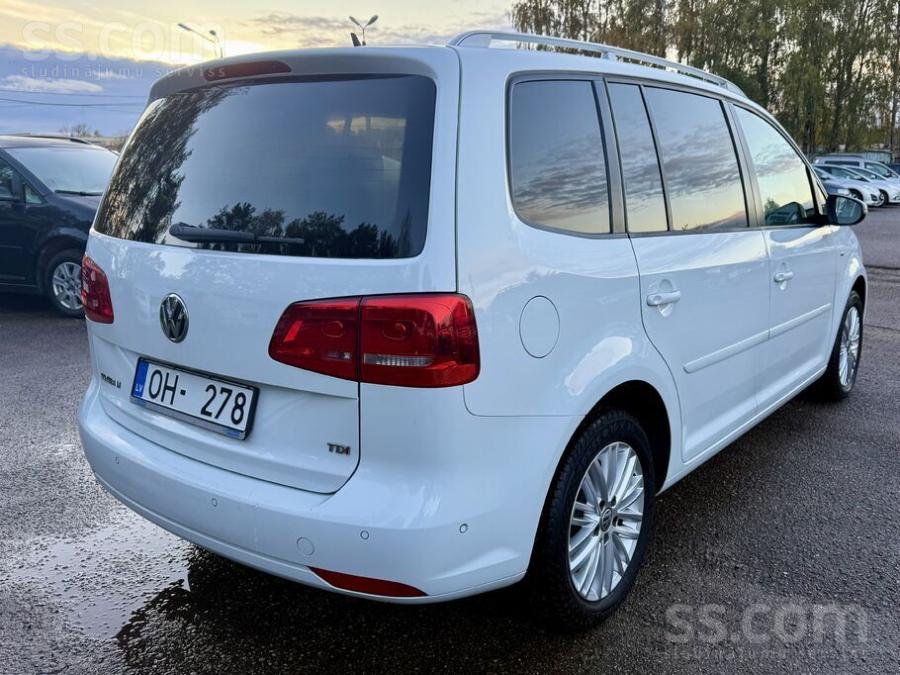 White Volkswagen Touran 2015 in Riga, with an engine capacity of 1.60 L and mileage of 0 thousand km for 6750 €, photo 5 on AUTOMOTO.COM.LV
