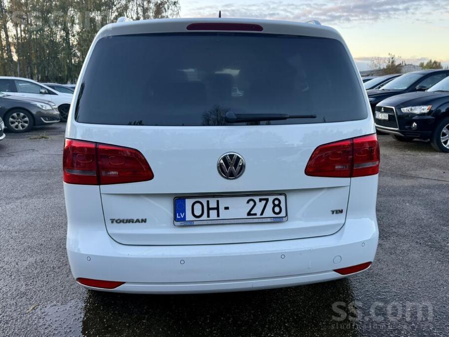 White Volkswagen Touran 2015 in Riga, with an engine capacity of 1.60 L and mileage of 0 thousand km for 6750 €, photo 6 on AUTOMOTO.COM.LV