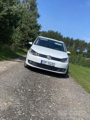 White Volkswagen Touran 2015 in Ogre, with an engine capacity of 2.00 L and mileage of 285 thousand km for 7200 €, photo  on AUTOMOTO.COM.LV