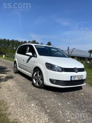 White Volkswagen Touran 2015 in Ogre, with an engine capacity of 2.00 L and mileage of 285 thousand km for 7200 €, photo 3 on AUTOMOTO.COM.LV